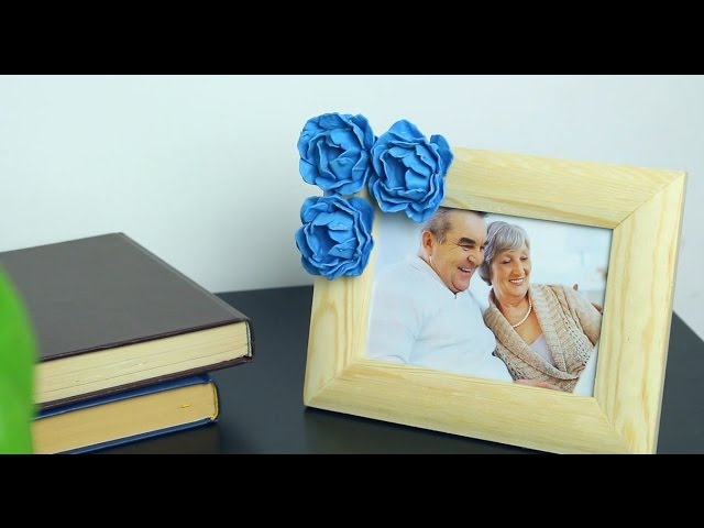 Update a picture frame with egg box flowers