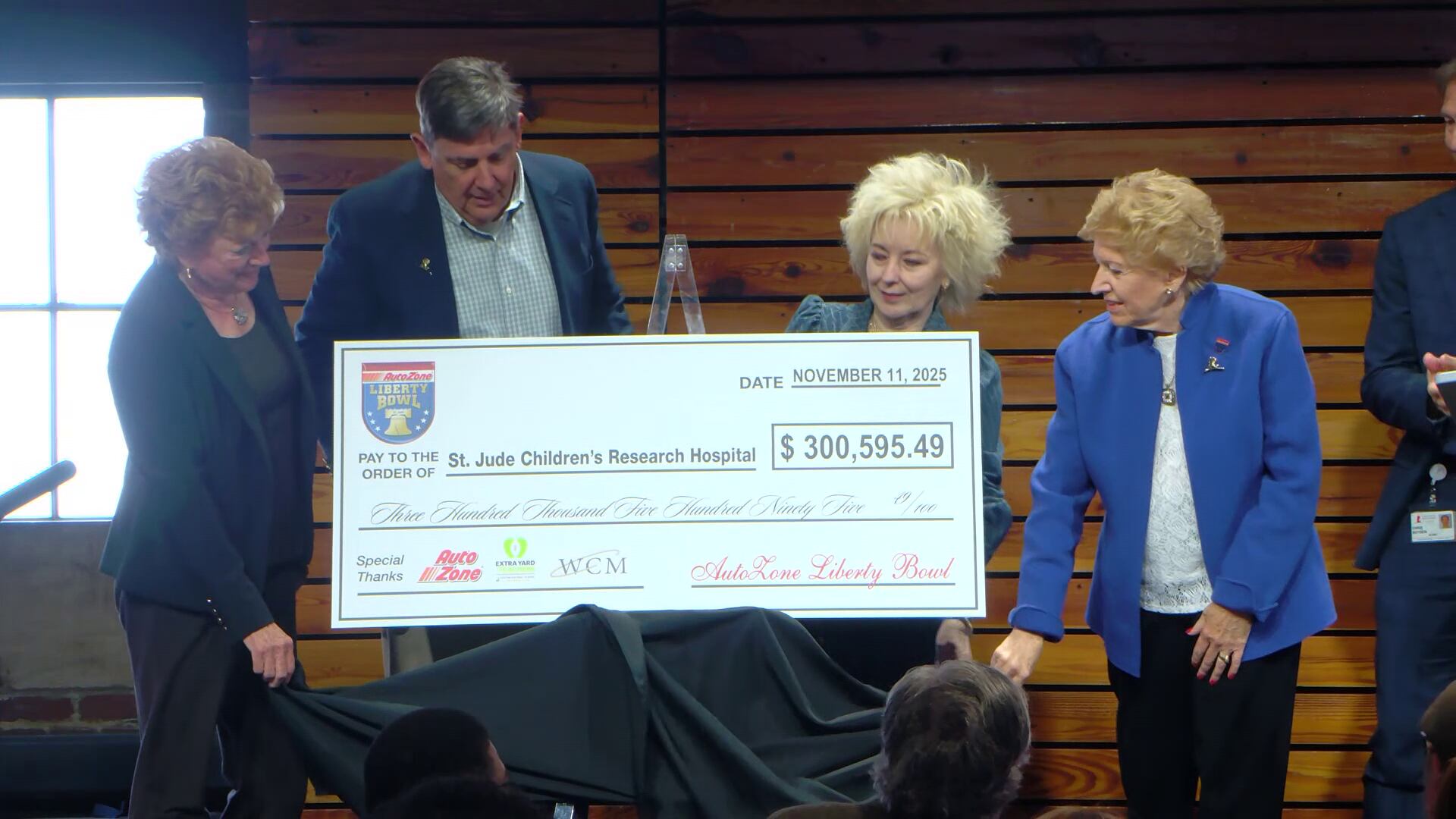 AutoZone Liberty Bowl presents $300K check to St. Jude