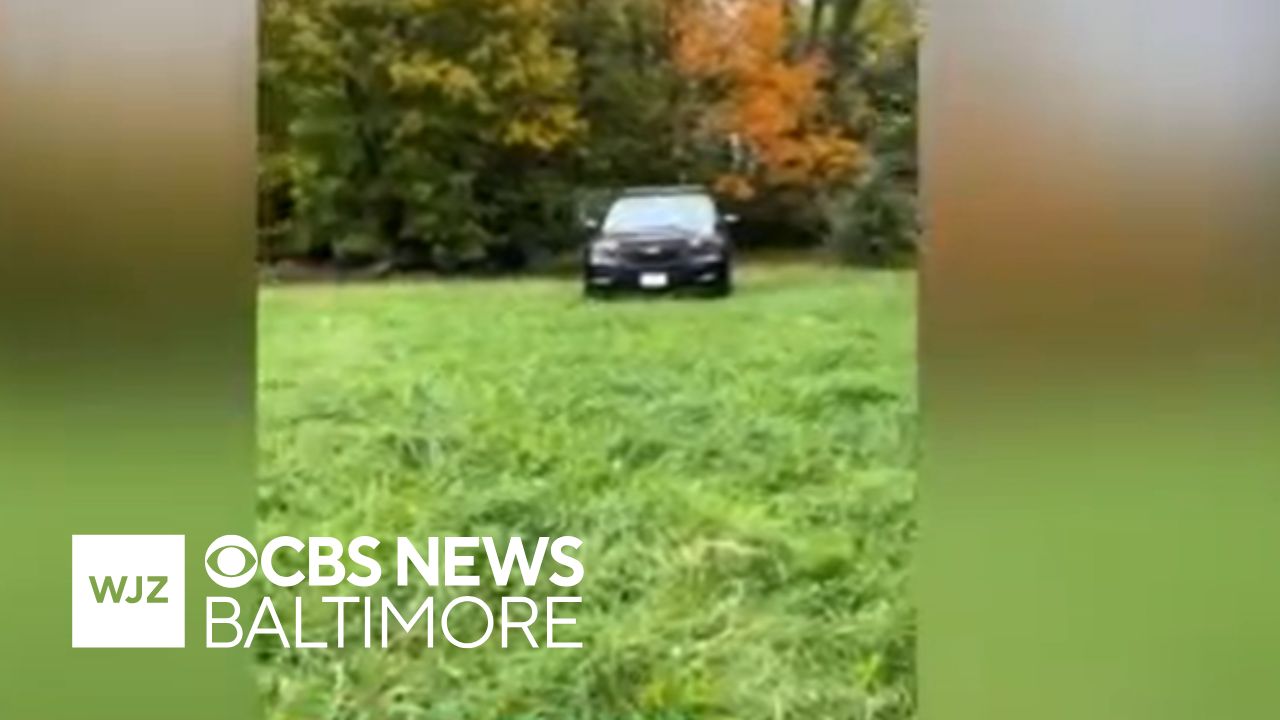 Baltimore officer accused of trying to run man over suspended without pay