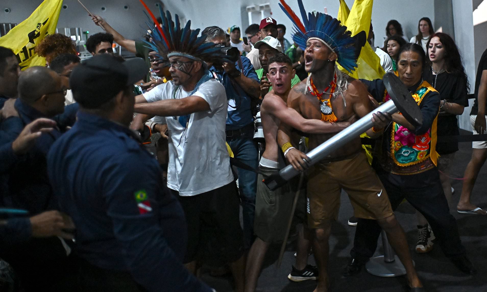Chaos at COP30 as indigenous protesters force their way into climate ...