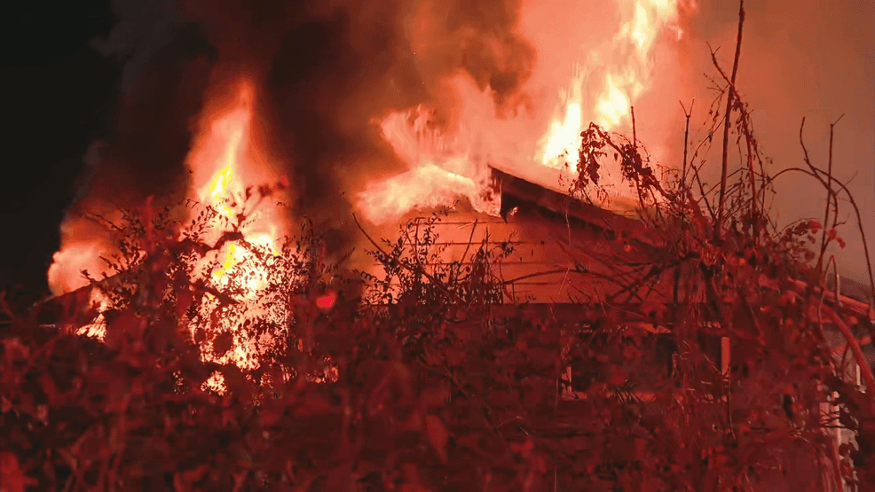 Firefighters suffer minor injuries battling large house fire in Charleston