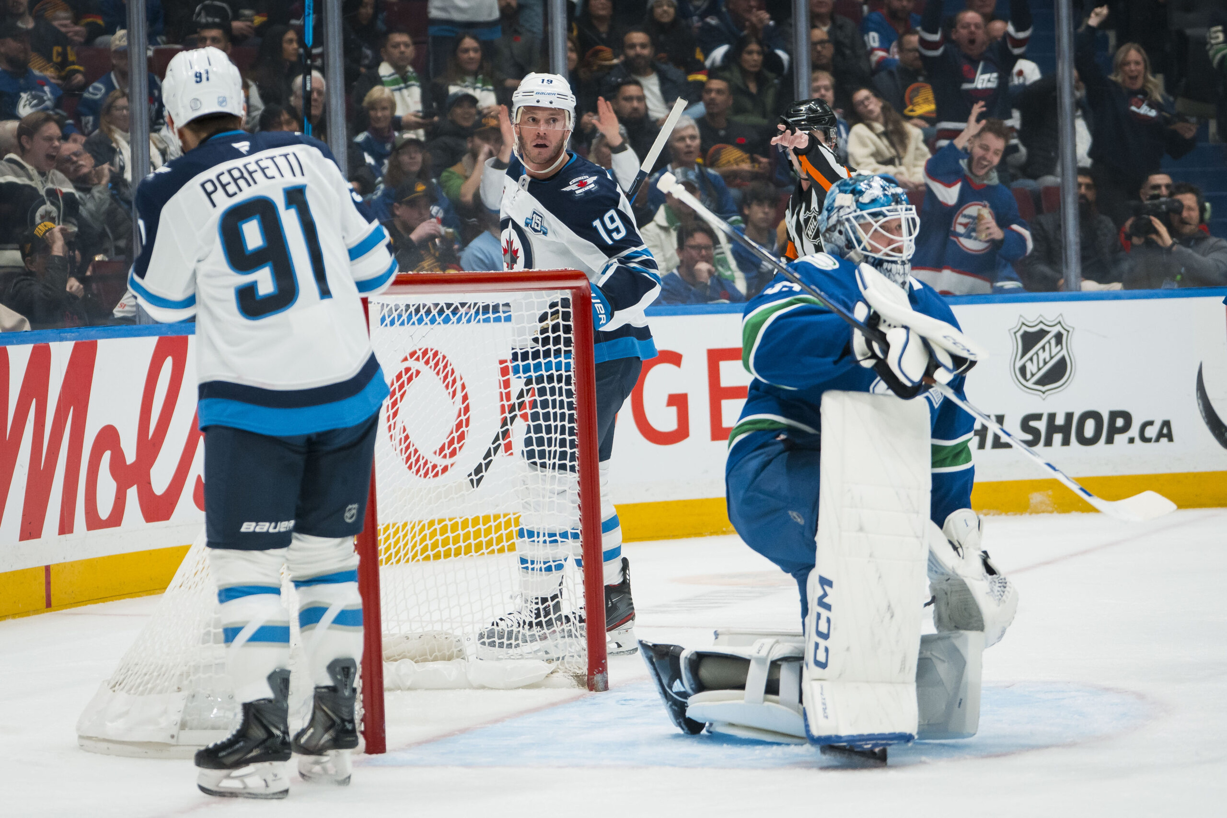 Canucks’ Thatcher Demko exits after first period vs. Jets with apparent ...