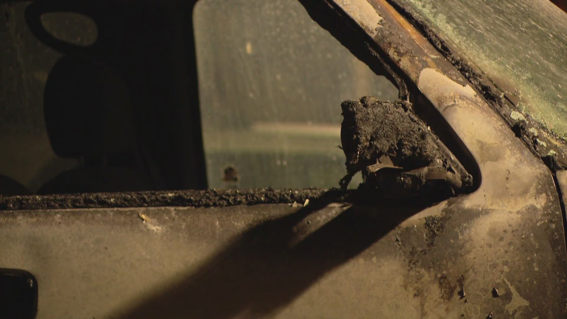 Fire damages building, car near Central High School; swim meet interrupted