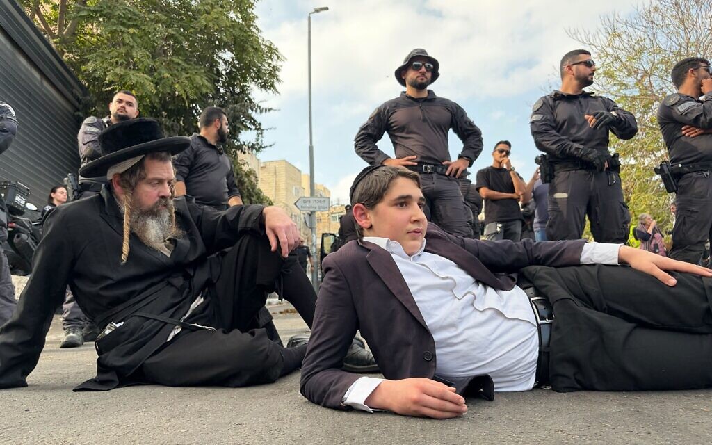 Dozens of Haredi men block road outside Jerusalem IDF recruitment ...