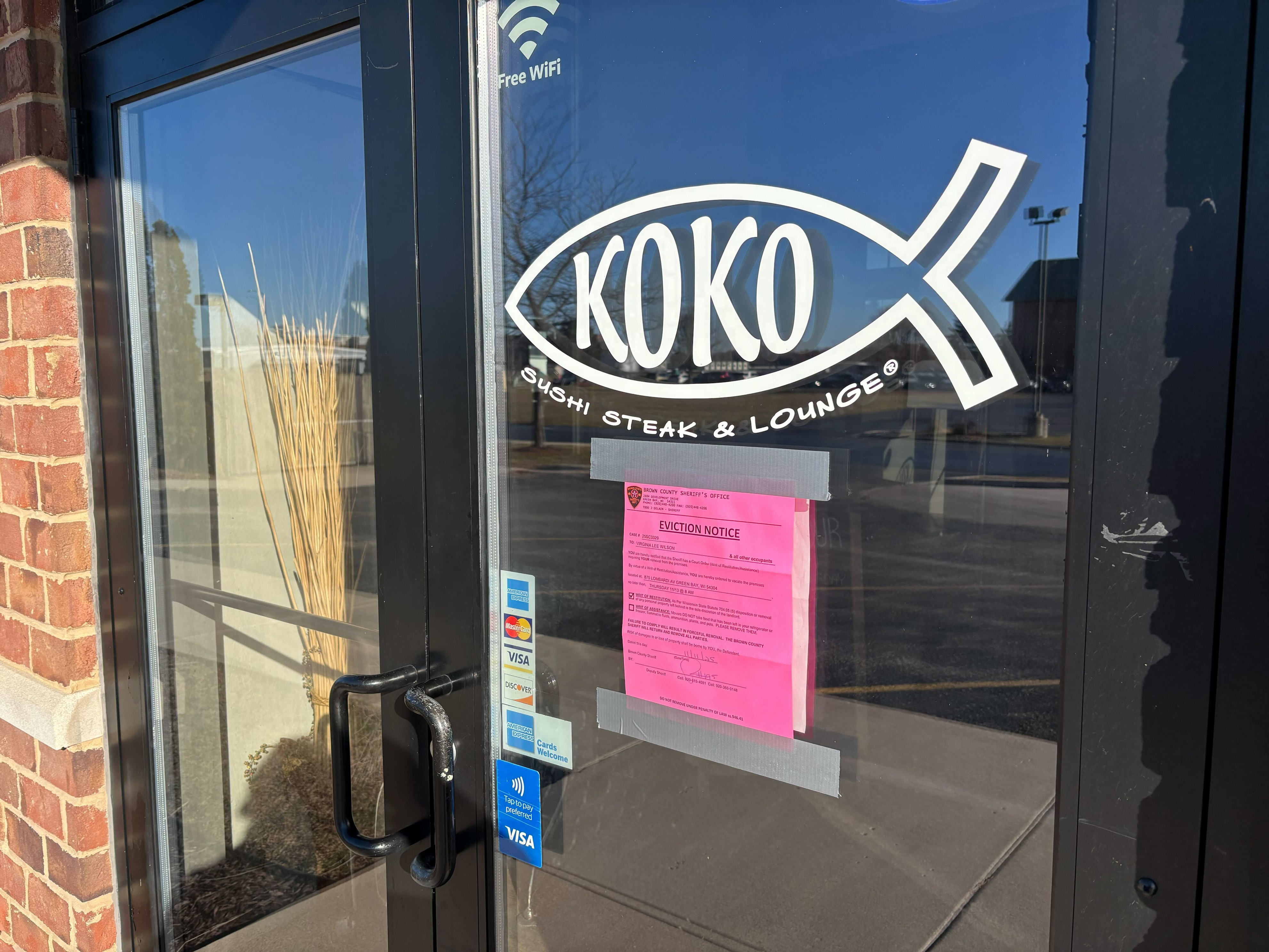 Eviction notice taped on Koko Sushi Bar and Lounge front door