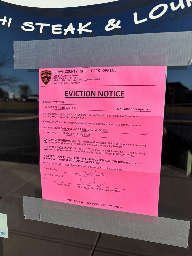 Eviction notice taped on Koko Sushi Bar and Lounge front door