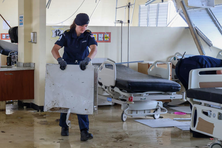 Hurricane Melissa: 39 pictures of helpful Royal Navy sailors repairing ...
