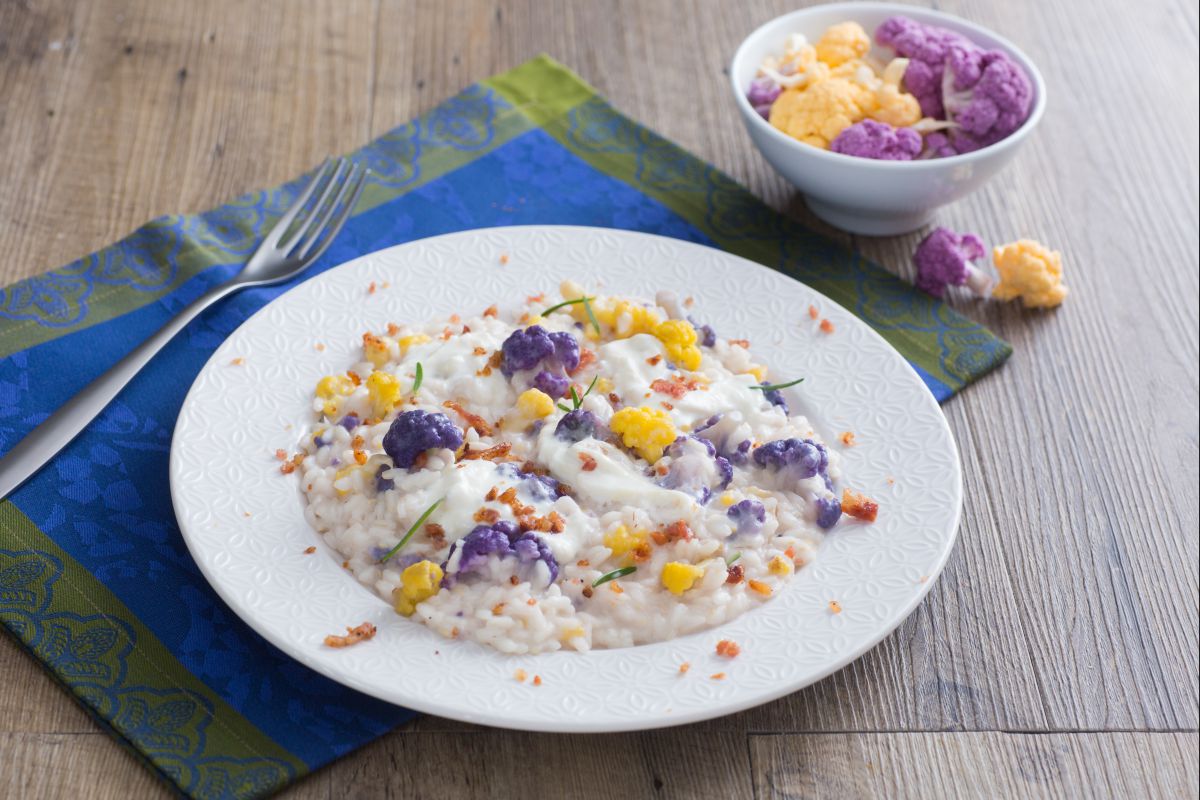 Risotto with colorful cauliflowers, stracciatella, and guanciale