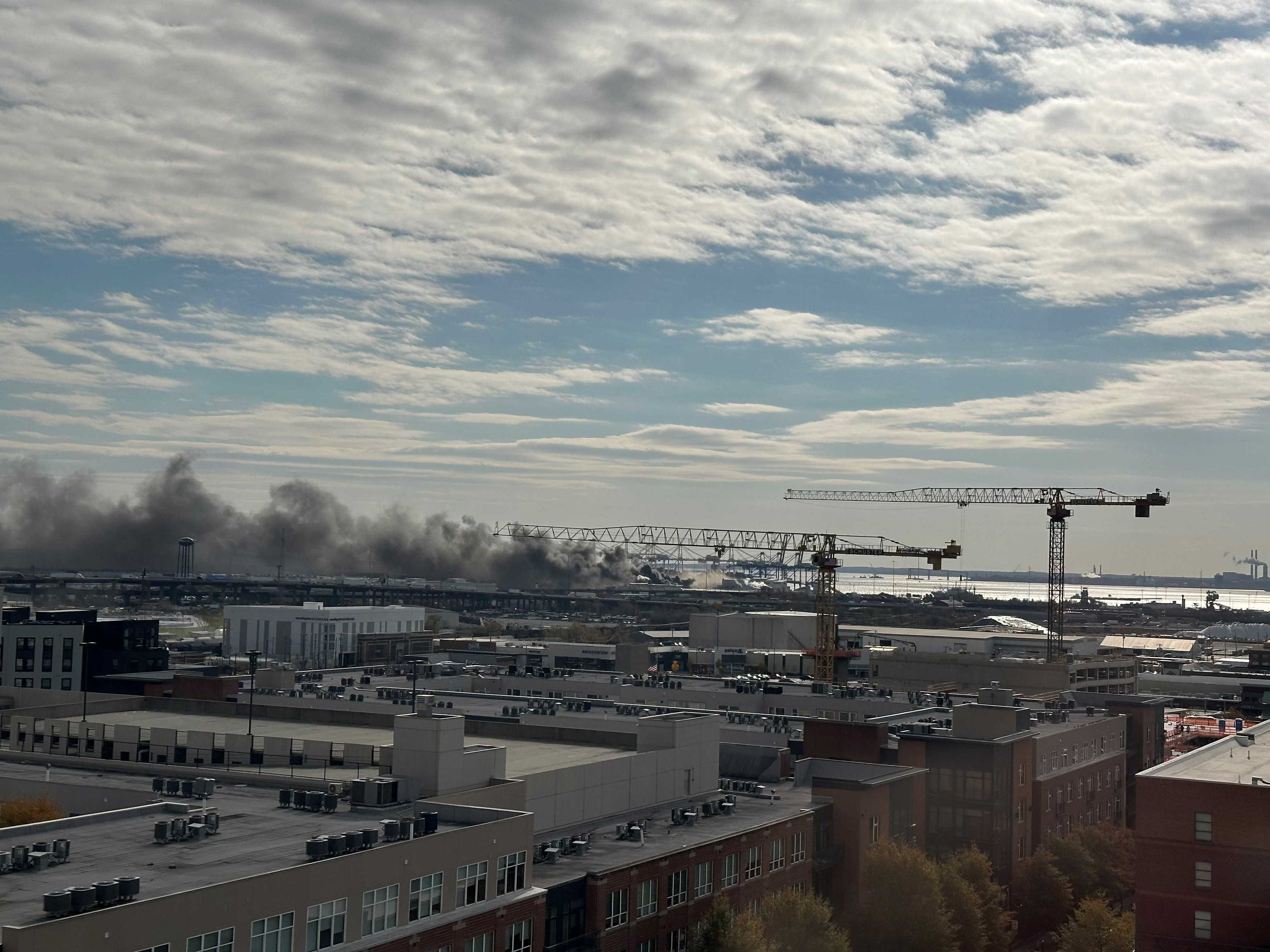 Smoke billows from multiple-alarm fire in Southeast Baltimore