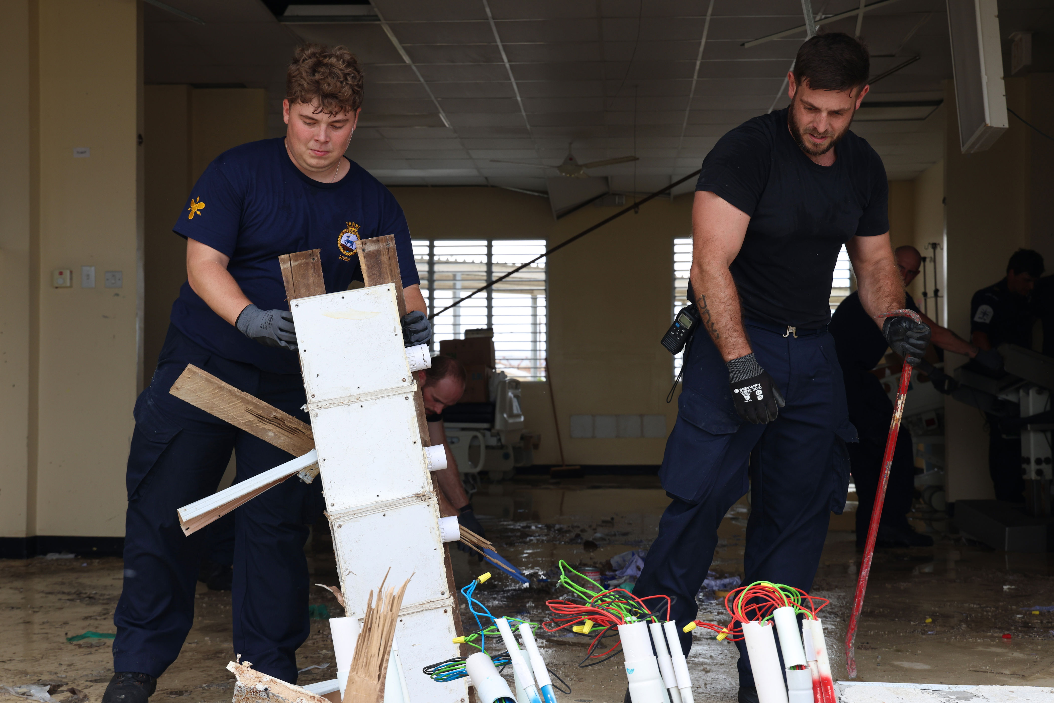 Hurricane Melissa: 39 pictures of helpful Royal Navy sailors repairing ...
