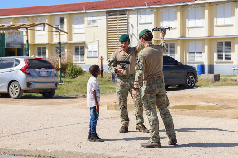 Hurricane Melissa: 39 pictures of helpful Royal Navy sailors repairing ...
