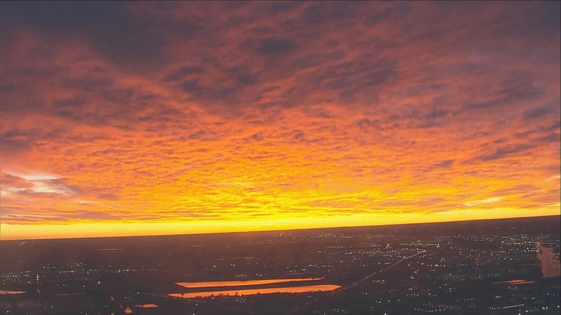 Orange 'Broncos' sunrise in Denver