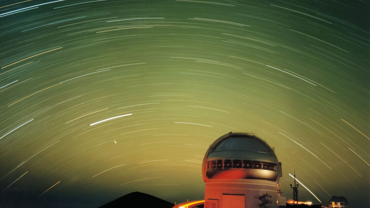 Star streaks in a green night sky | Space photo of the day for Nov. 12 ...