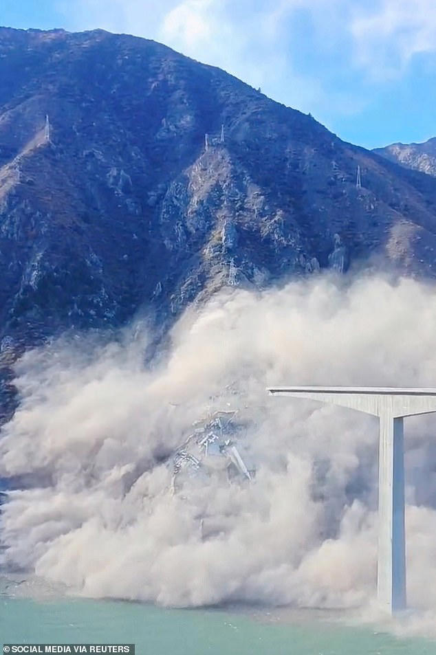 Terrifying moment China's new 2,500ft bridge collapses into river just ...