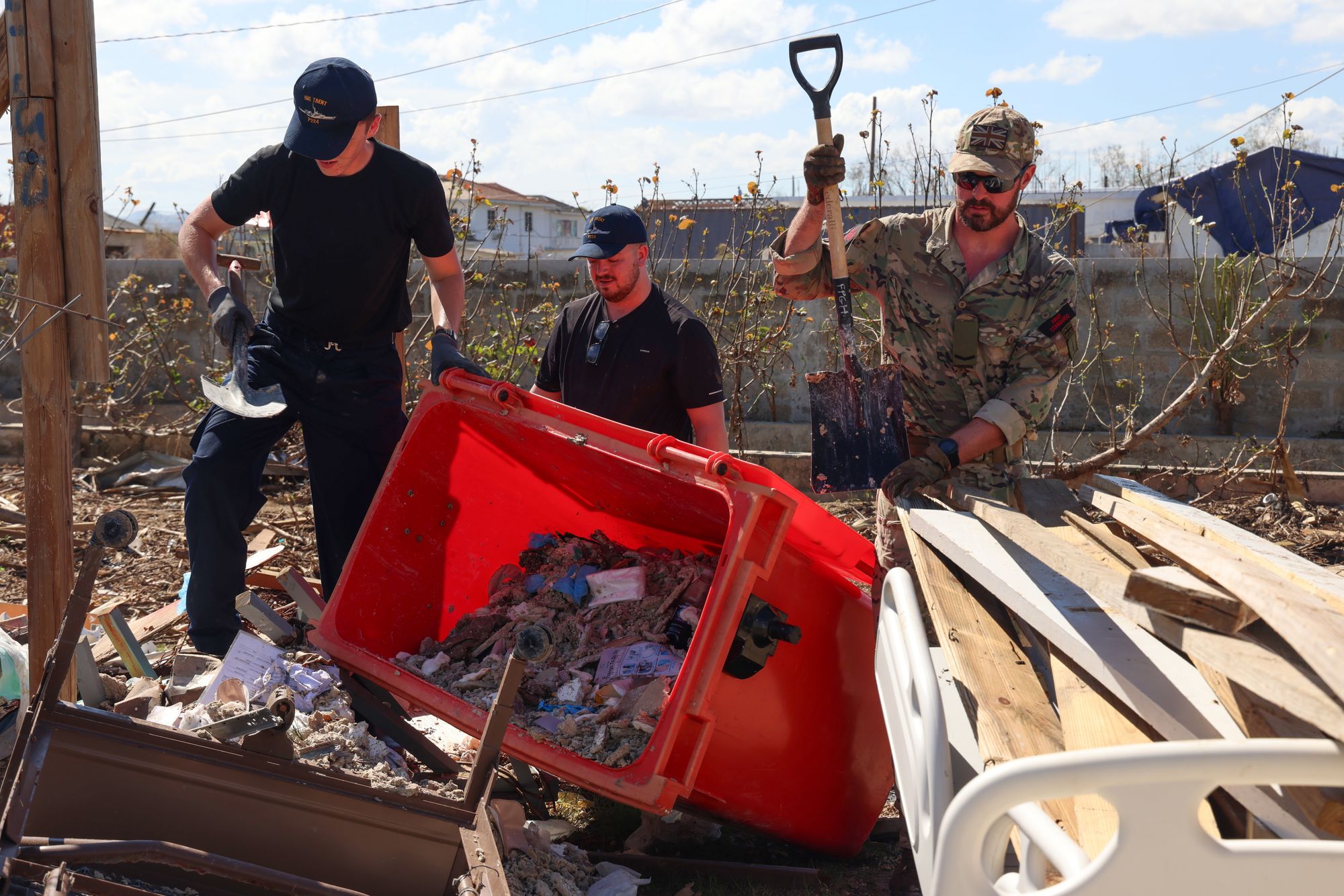 Hurricane Melissa: 39 pictures of helpful Royal Navy sailors repairing ...