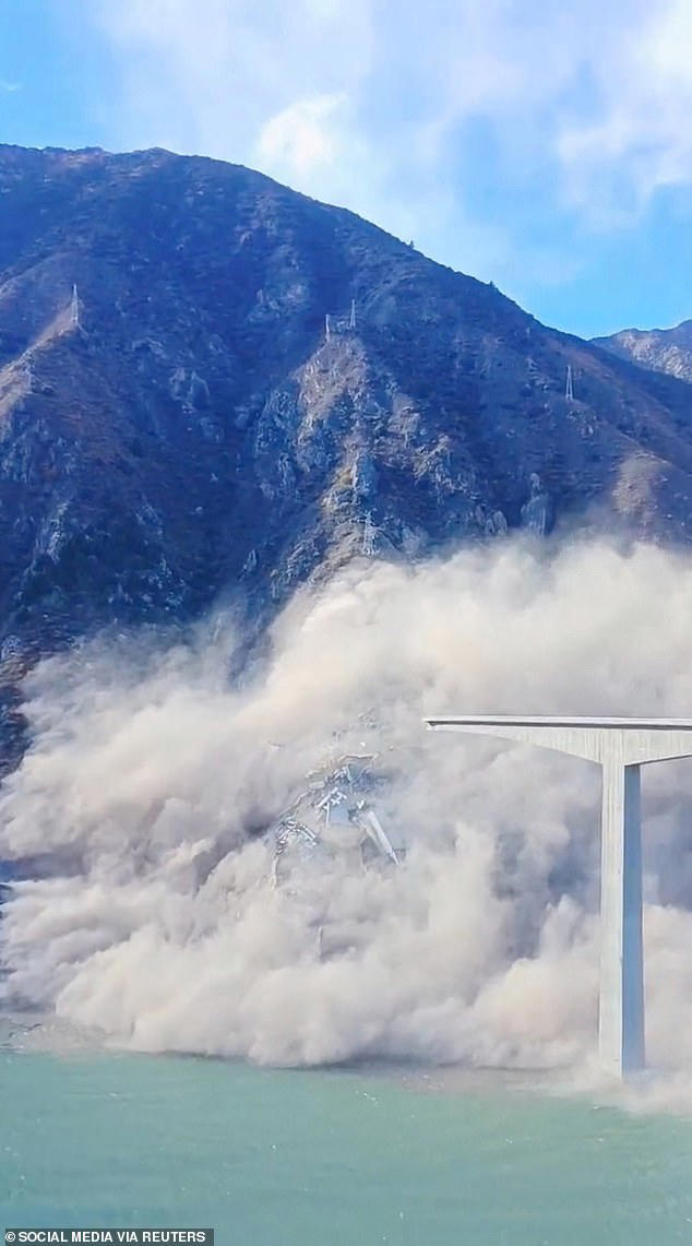 Terrifying moment new Chinese bridge collapses into mountainside