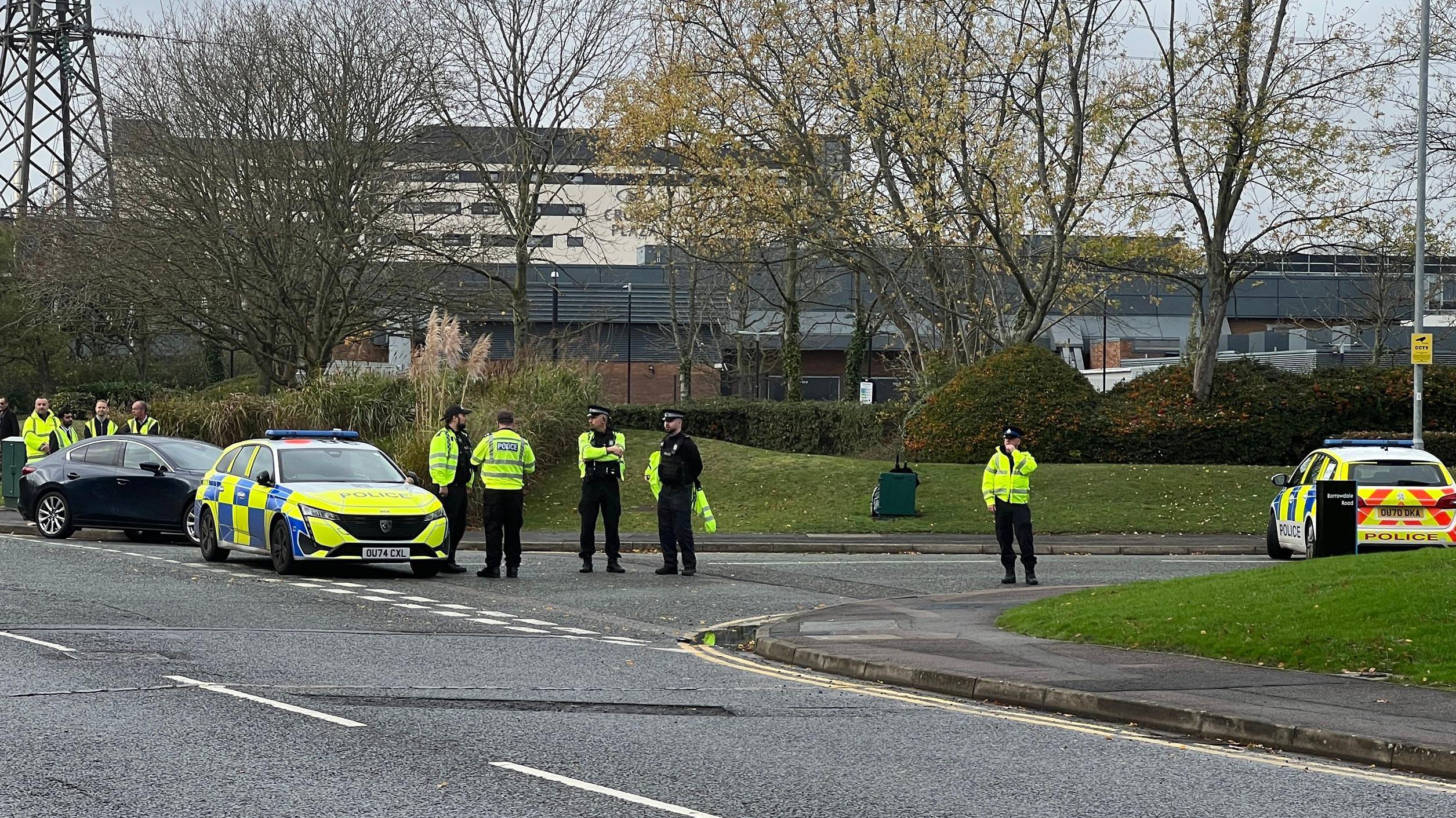 Two arrests after police called to rooftop protest