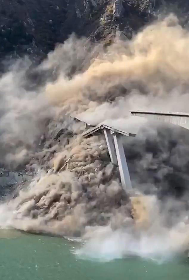 Terrifying moment new Chinese bridge collapses into mountainside
