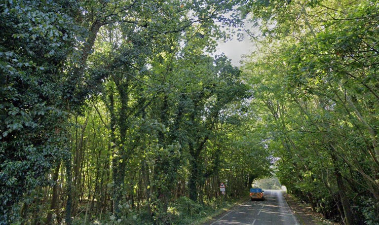 Road closed after reports of crash at village near Crawley