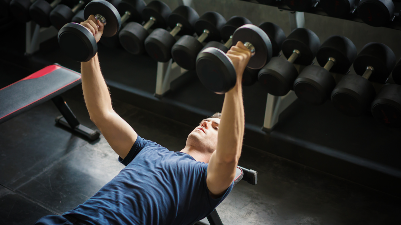 Two dumbbells, a bench and these four exercises to add strength and ...