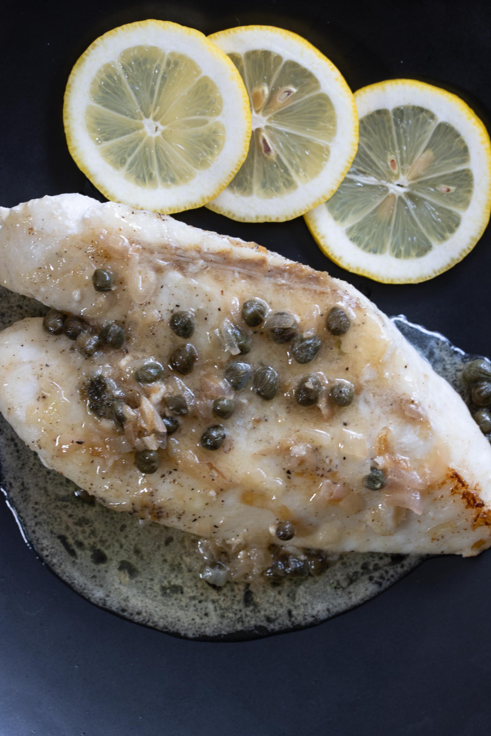 Orange Roughy Fish With Capers, Shallots, And Butter Sauce