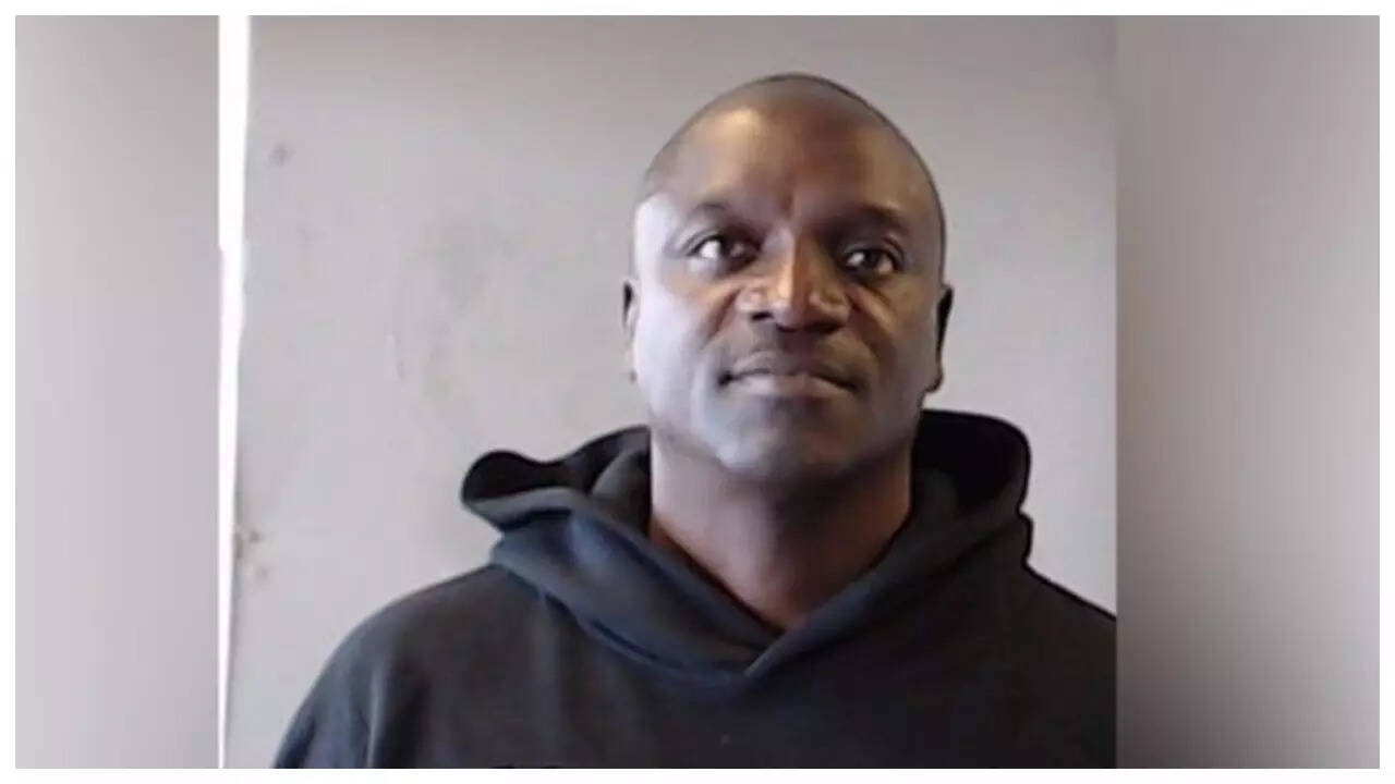 Akon ARRESTED in Georgia on outstanding warrant; singer's mugshot goes ...