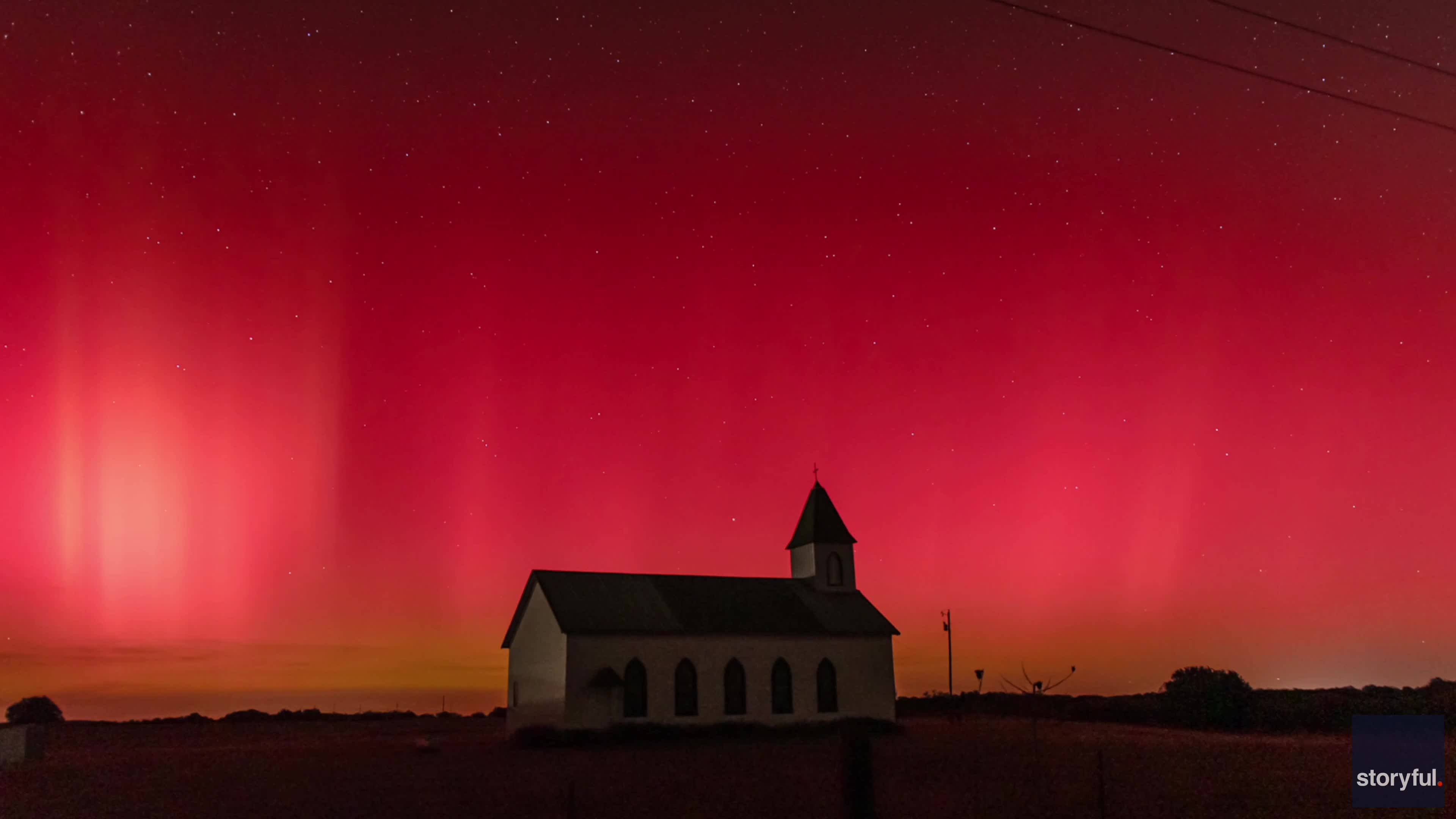 Stunning Ruby-Red Aurora Shimmers Over Rural Texas