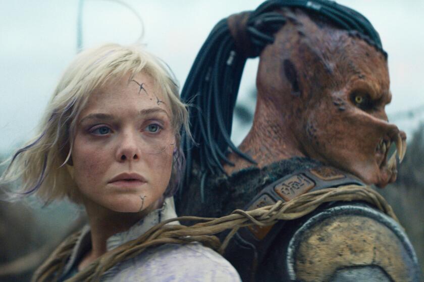 Even a robot needs a beastie bestie in 'Predator: Badlands,' enlivened ...