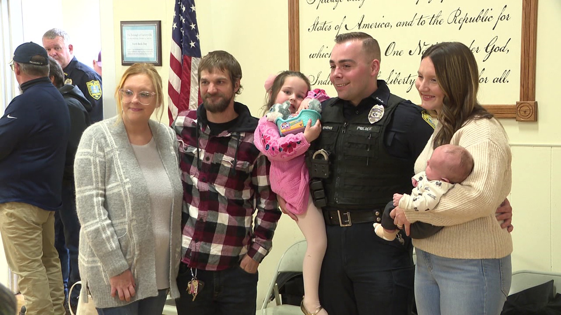 Man and the police officer he helped save honored by officials
