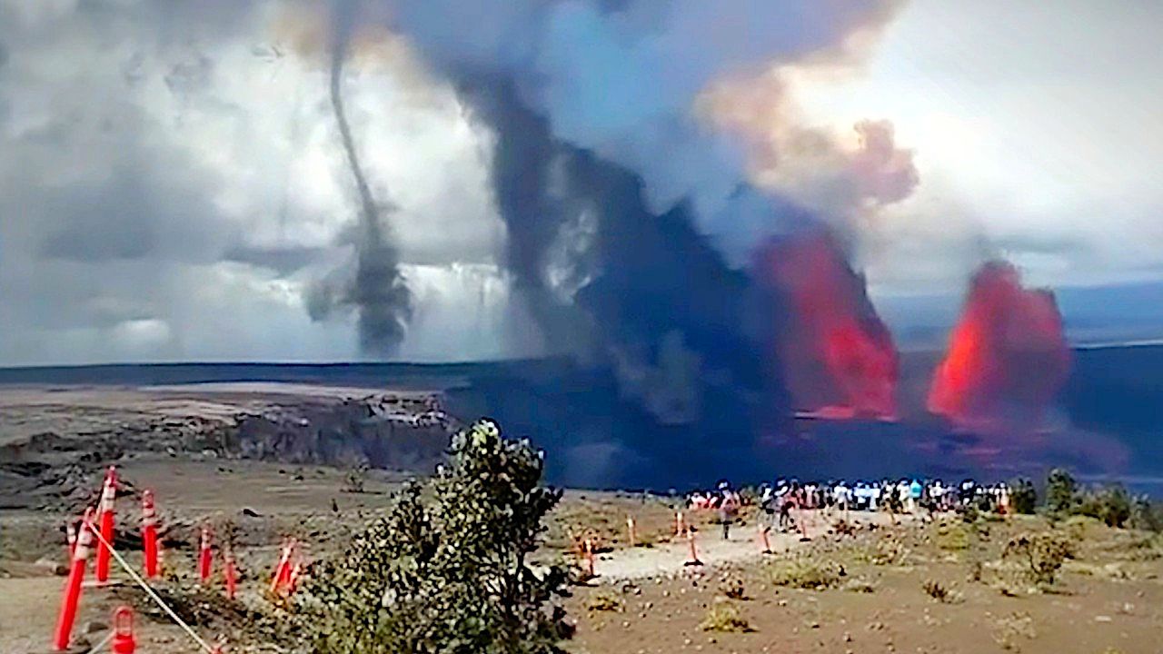 Rare 'volnado' swirls near Kīlauea volcano as lava blasts skyward