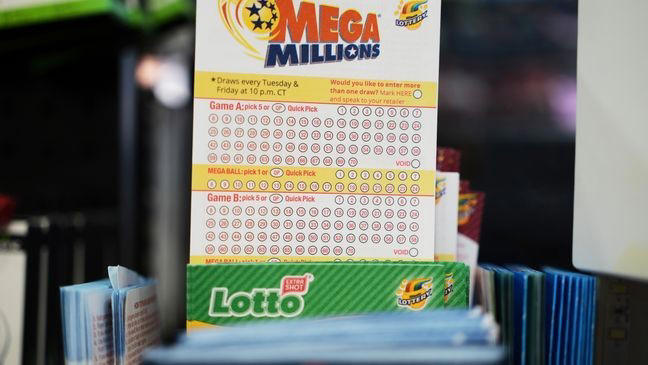 Powerball jackpot at $512M ahead Tuesday drawing, Mega Millions hits $965M