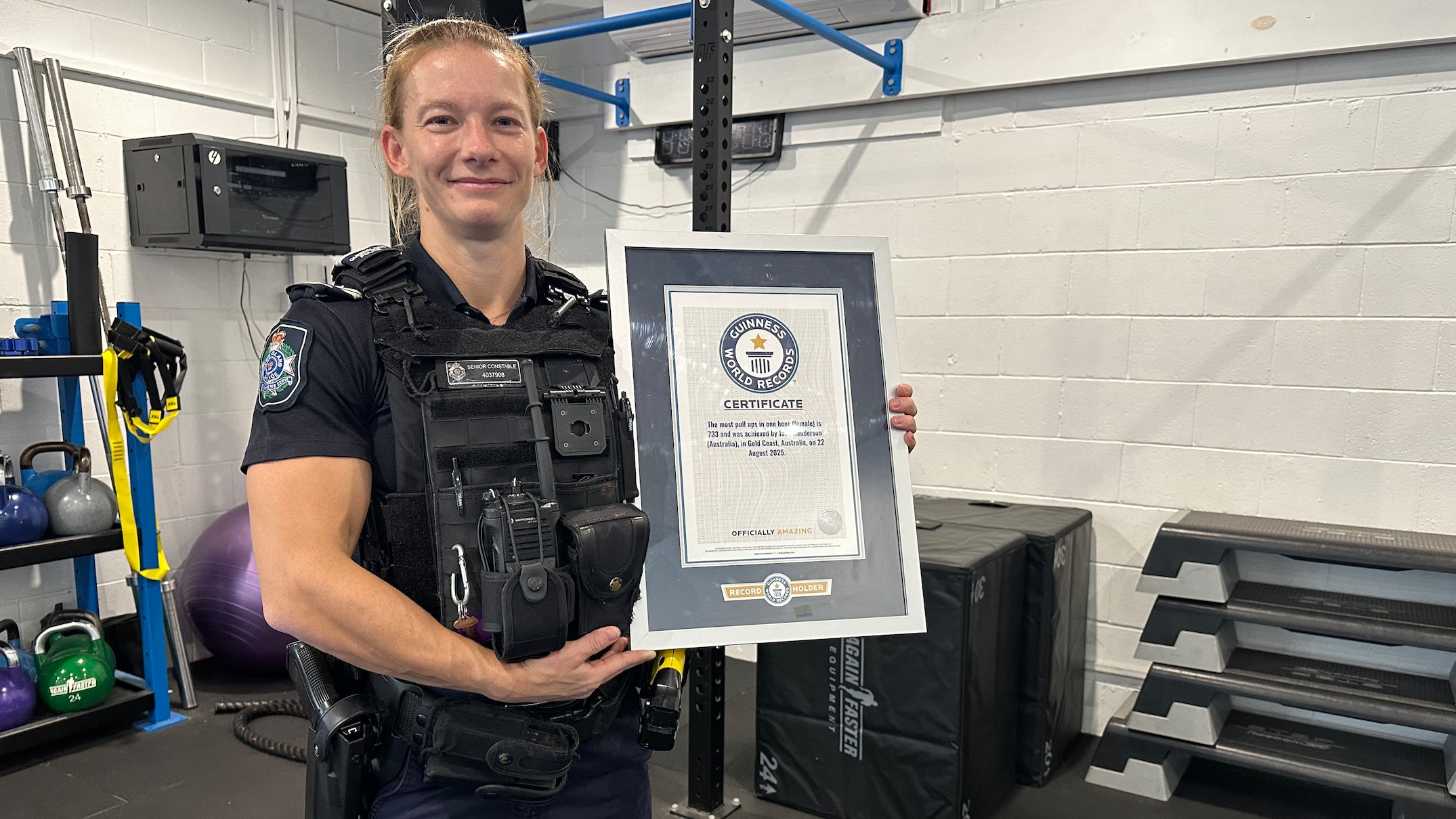 Gold Coast cop's pull-up world record marred by online abuse