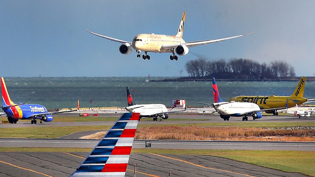 Logan Airport travelers remain anxious as House votes on government ...