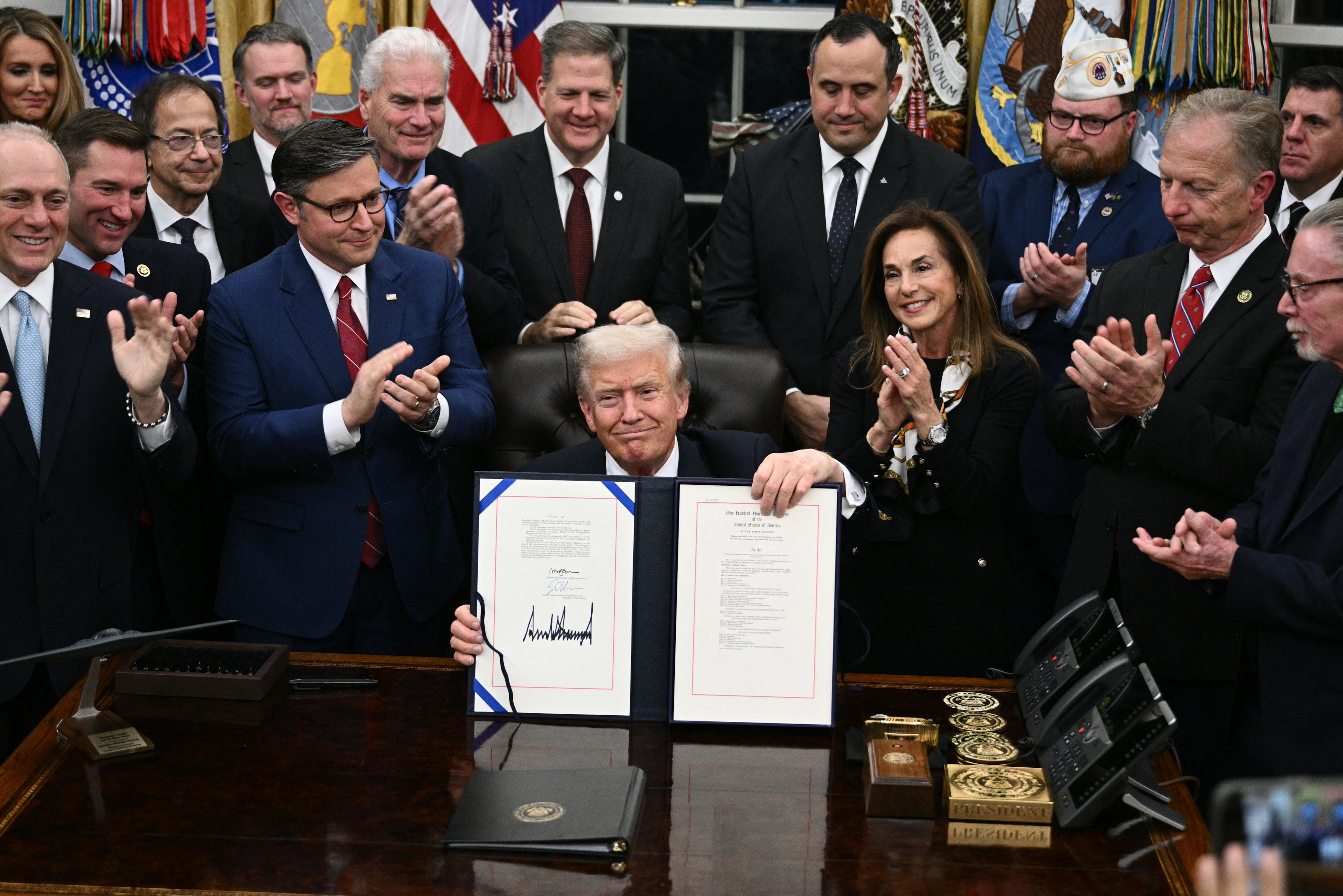 Trump signs funding deal to end longest-ever government shutdown. Updates