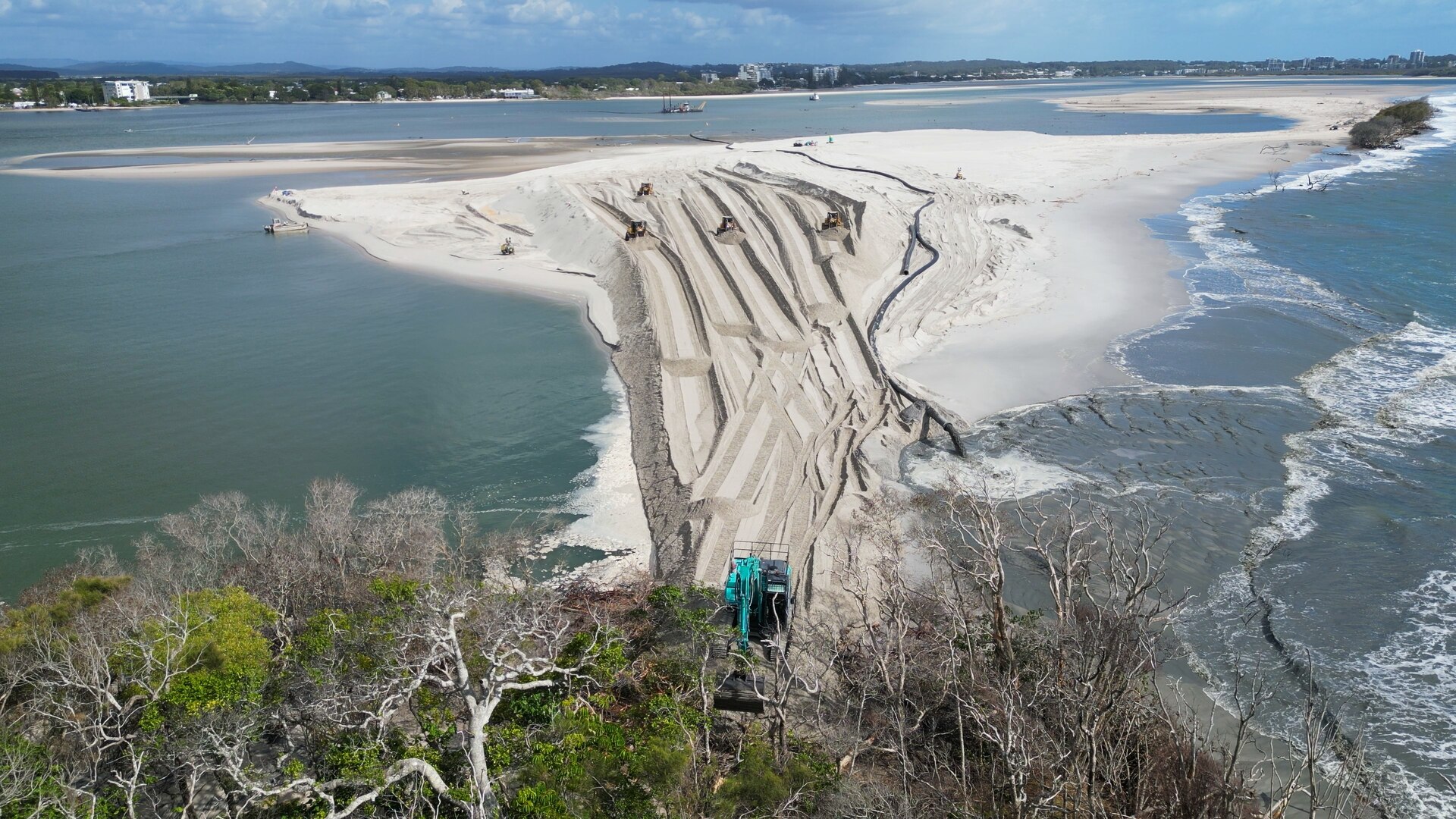 Bribie Island officially reconnected as workers close breakthrough