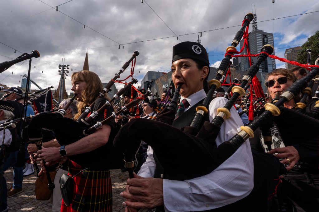 Hundreds of bagpipers, including 98-year-old, break world record with ...
