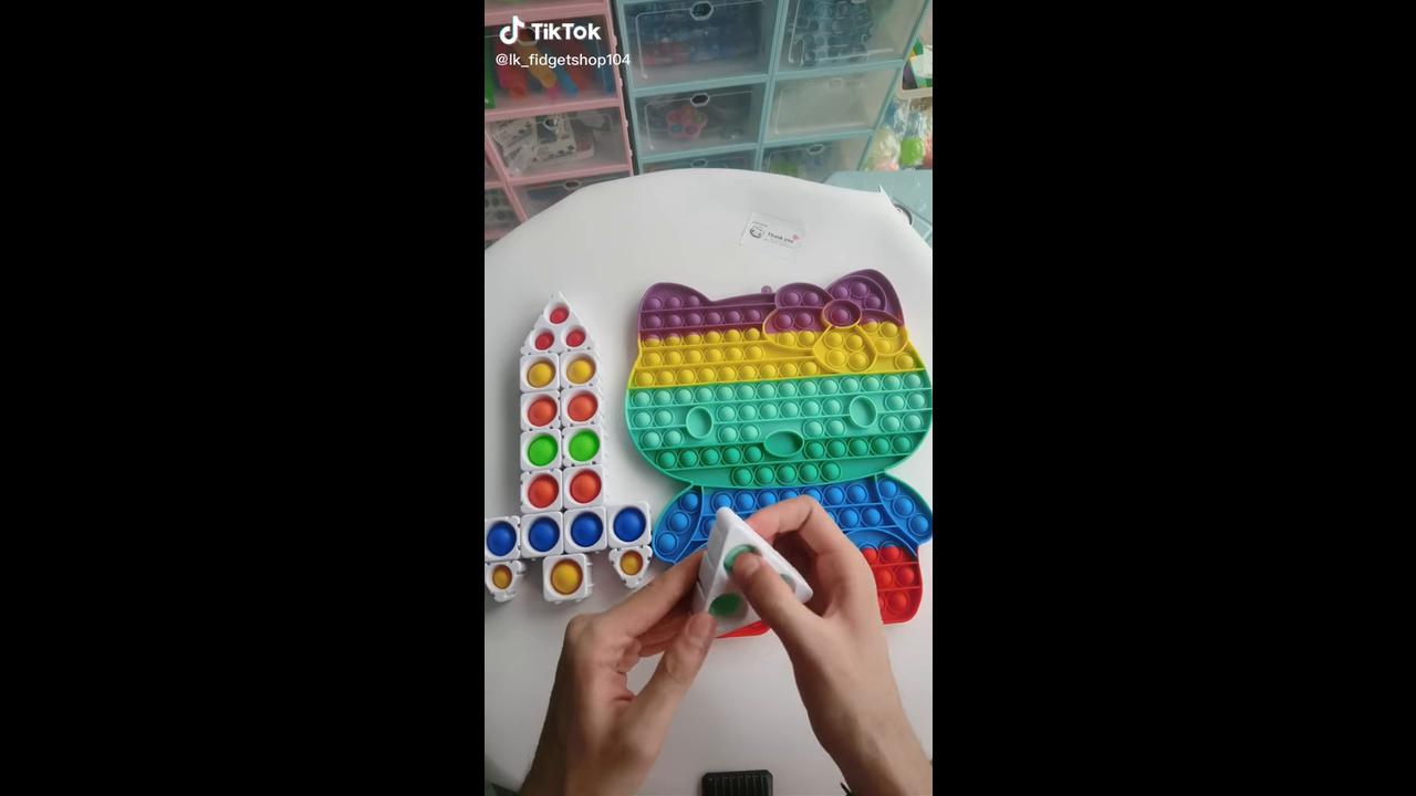 Playing Hello Kitty Pop It