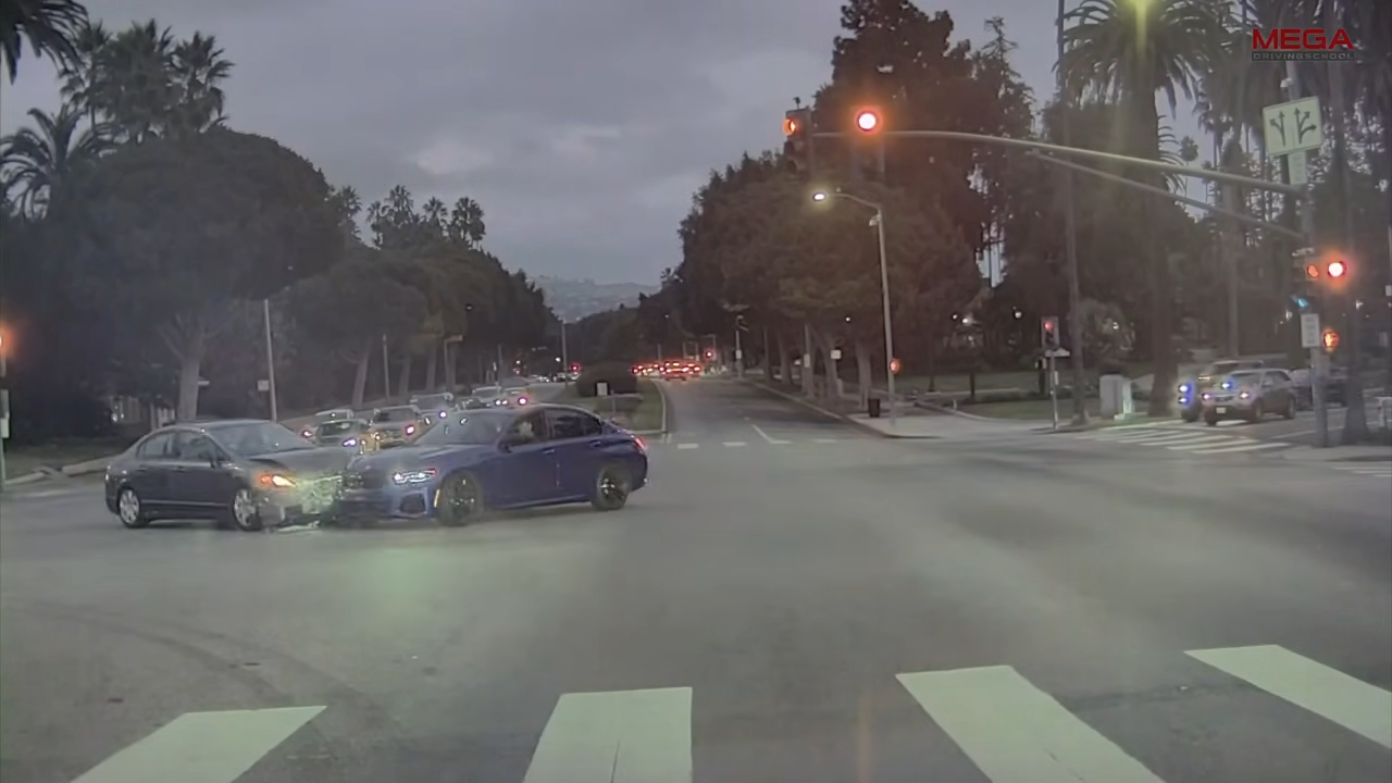 Tragic Moment As Car Blows Through Red Light