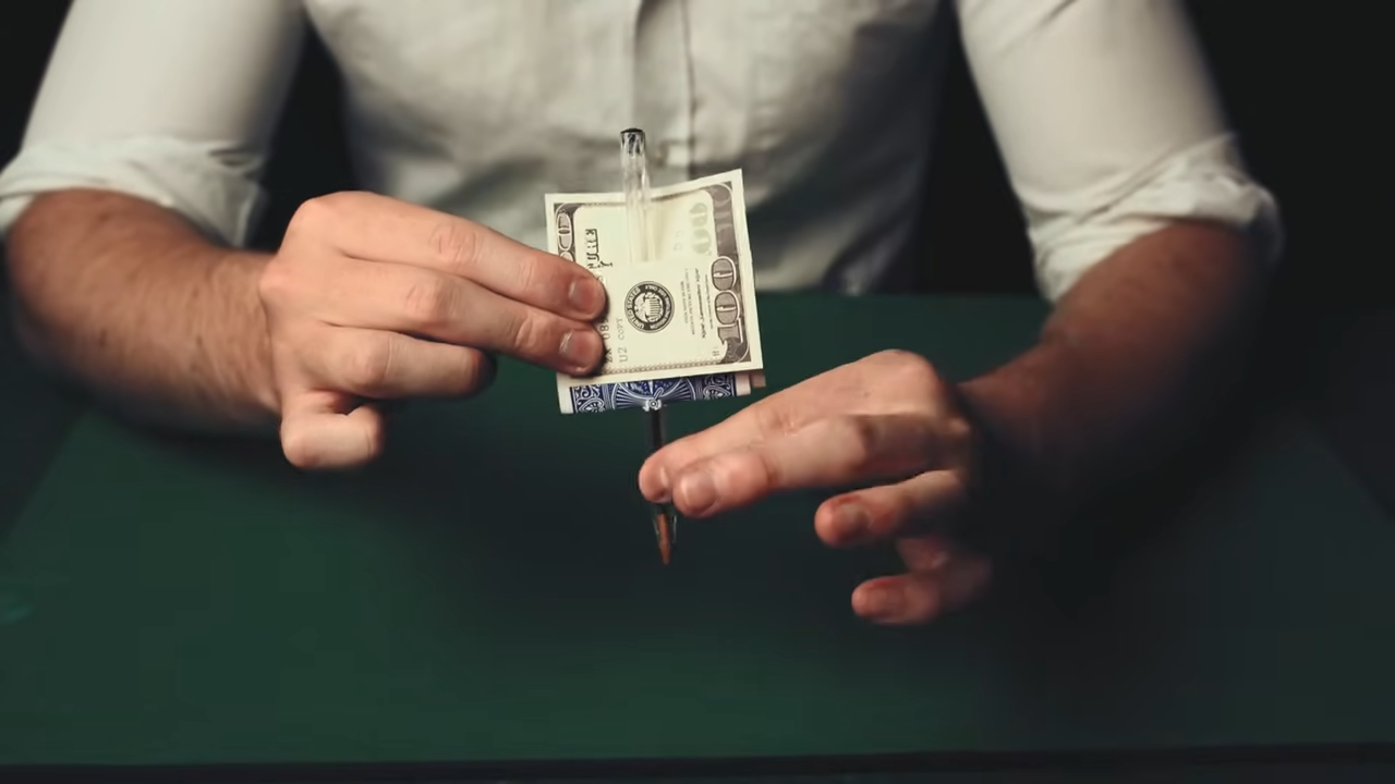 What makes this pen trick look completely impossible