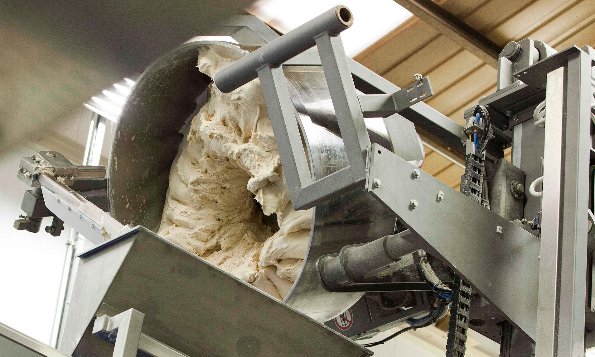 Baker is strangled to death when her scarf gets caught in dough mixing ...