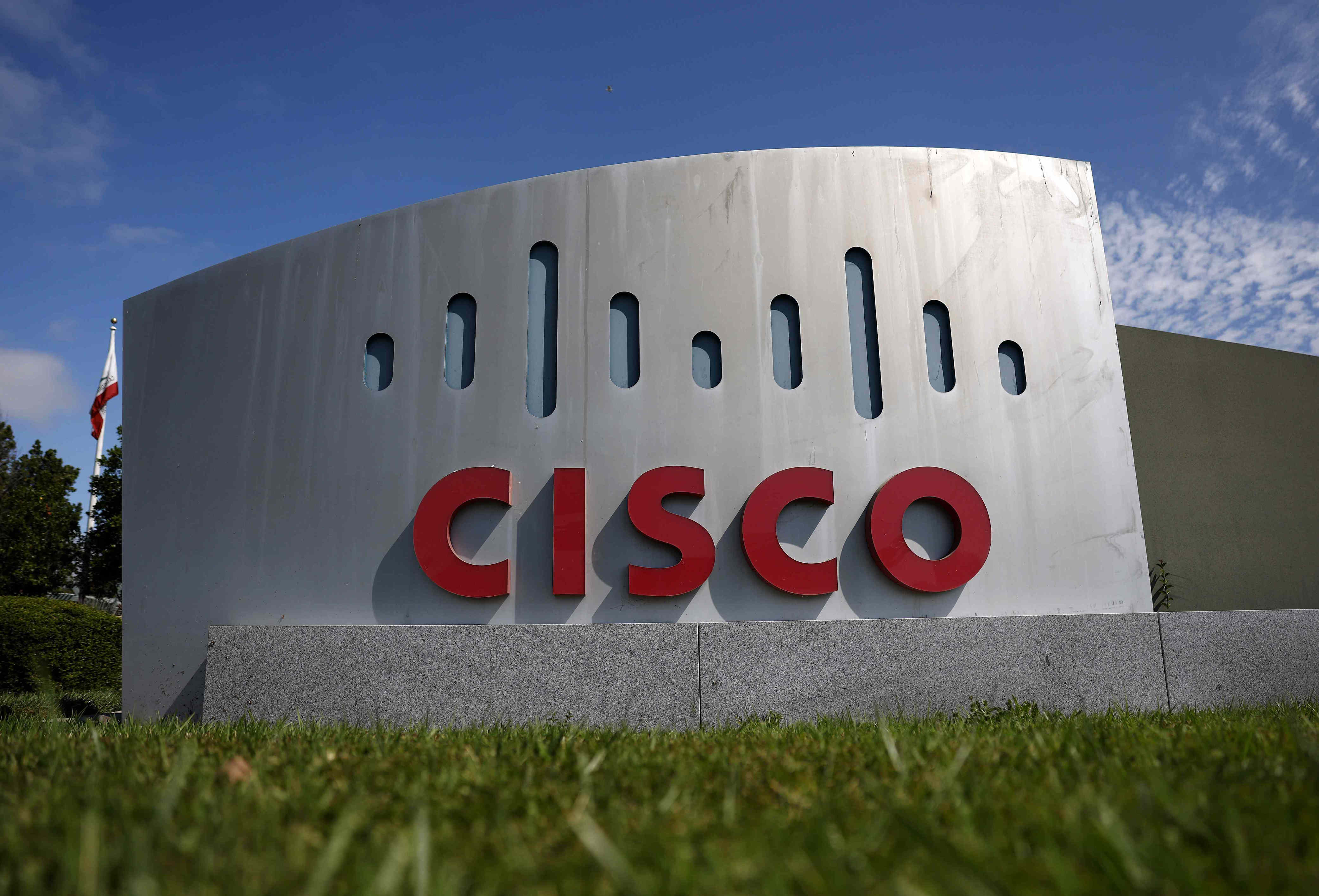 Top Stock Movers Now: Cisco Systems, Walt Disney, Sealed Air, and More