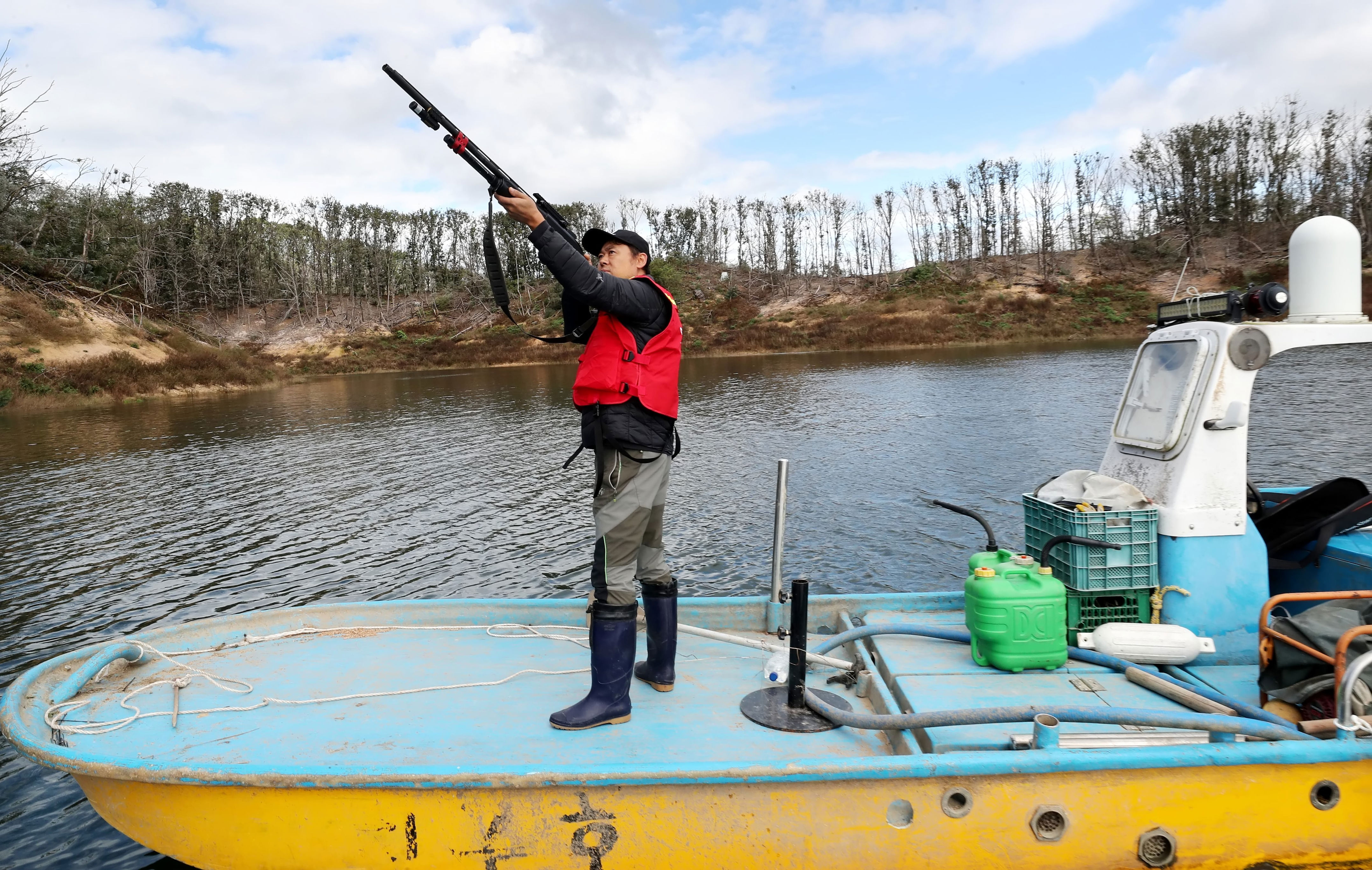 Fishermen Trade Nets for Guns in Andongho's Cormorant War