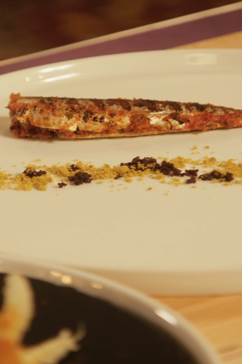 Grilled piri piri sardines with olive “soil”