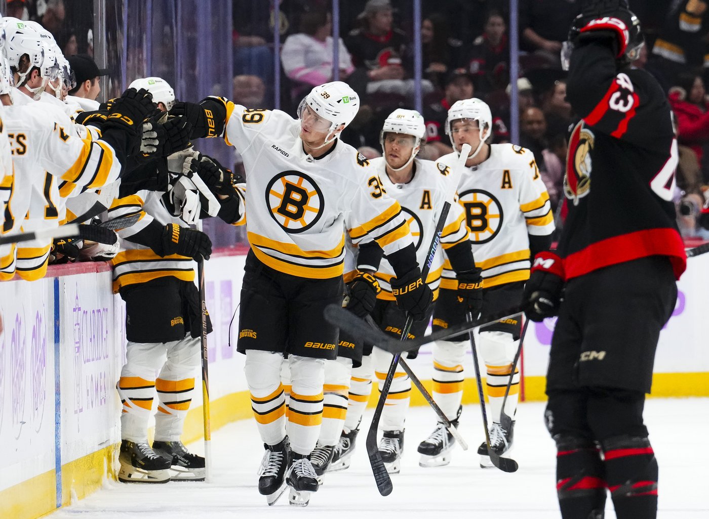 Stutzle scores two, Ottawa Senators down Bruins 5-3 to snap Boston's ...