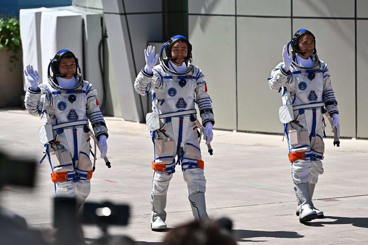 Stranded Chinese space station astronauts return on new crew’s capsule