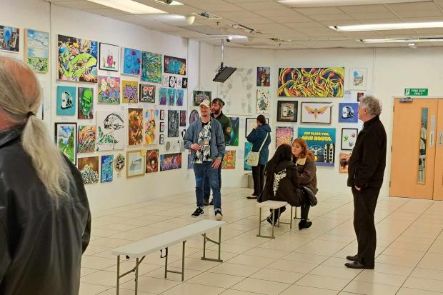 Raw Wall Collective celebrates emerging artists at sold out exhibition