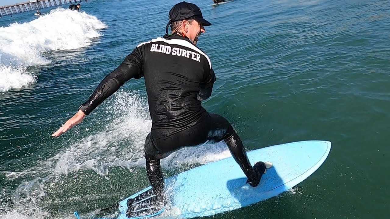 Blind guy surfing, biking, skating, hiking and more