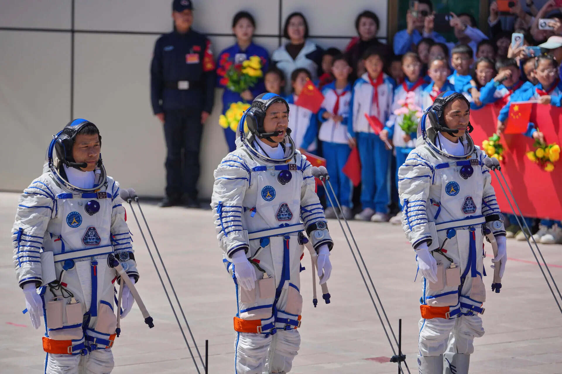 Chinese astronauts return from space station after delay blamed on ...