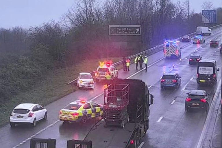 M4 closed after two crashes as four-vehicles collide and one person cut ...