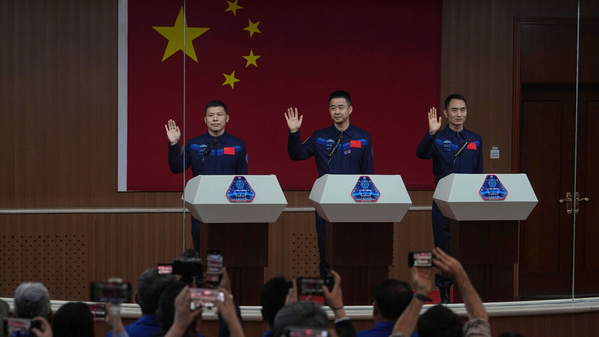 Chinese astronauts return from space station after delay blamed on ...